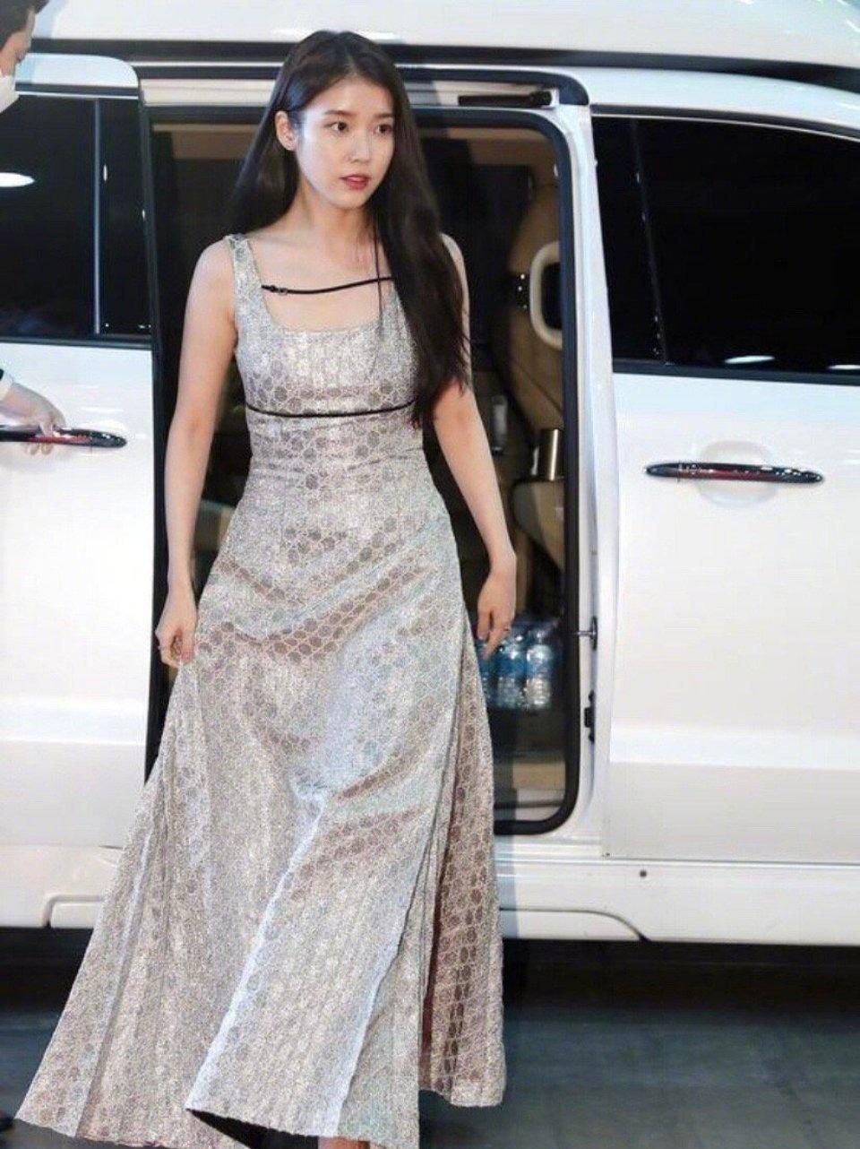 The outfit depends on the face series. IU wears a loose and unfitting T ...