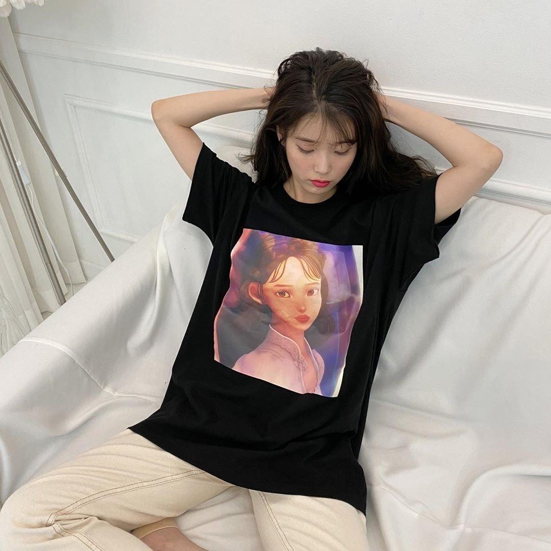 The outfit depends on the face series. IU wears a loose and unfitting T ...