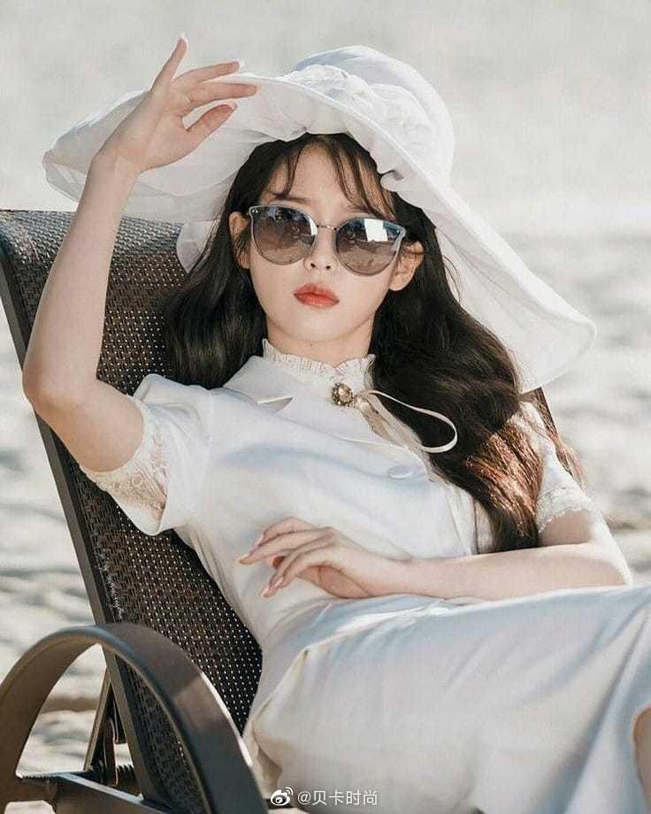 The outfit depends on the face series. IU wears a loose and unfitting T ...